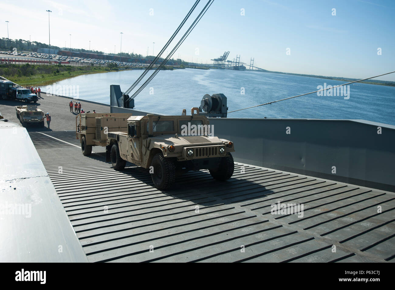 Vehicles from the 3rd Brigade Combat Team, 101st Airborne Division load ...