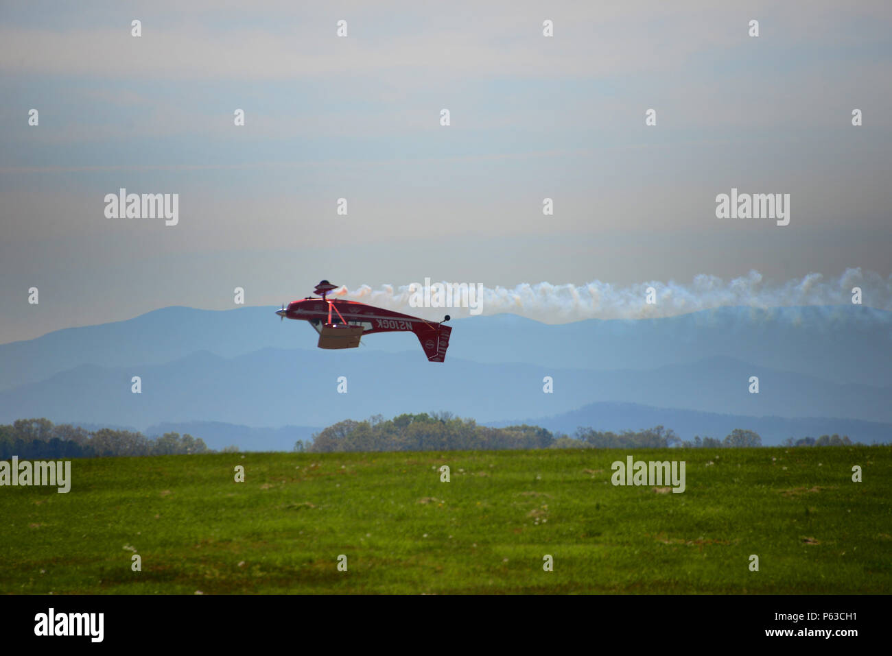 Pilot Greg Koontz performs an inverted low-altitude pass in a Super ...