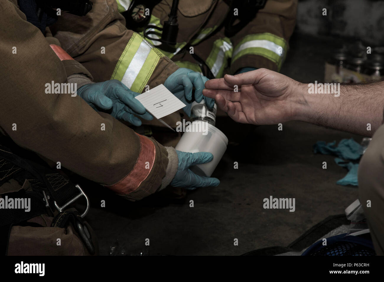 Camp Lejeune Fire and Emergency Service Division personnel, collect ...