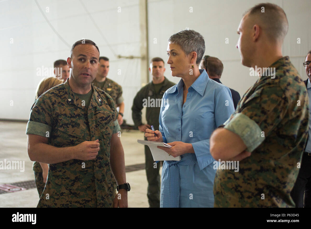U.S. Marine Corps Lt. Col. John W. Spaid VI, left, commanding officer ...