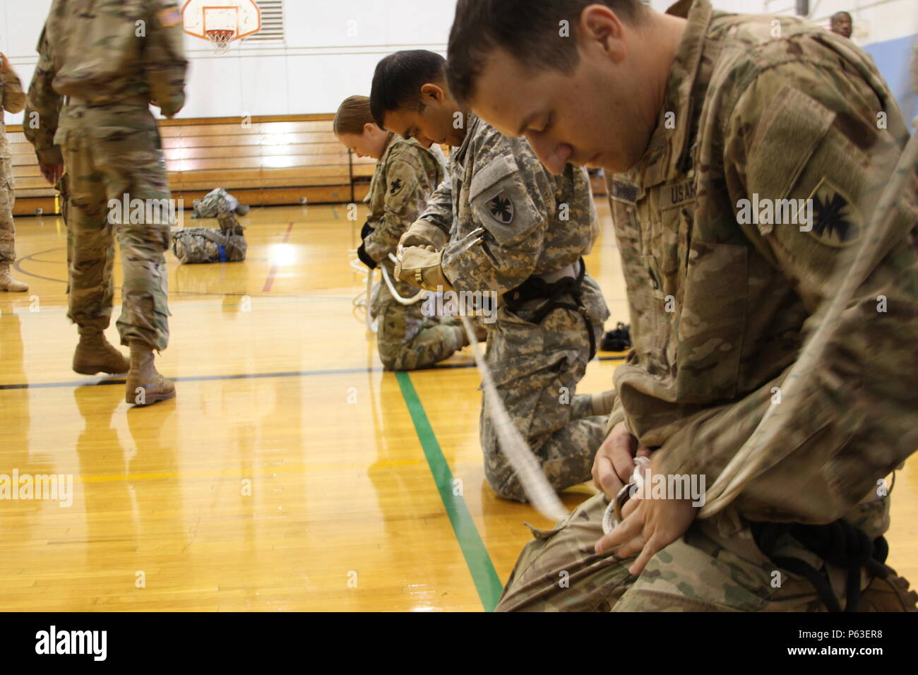 Soldiers with 8th Theater Sustainment Command practice hooking their ...