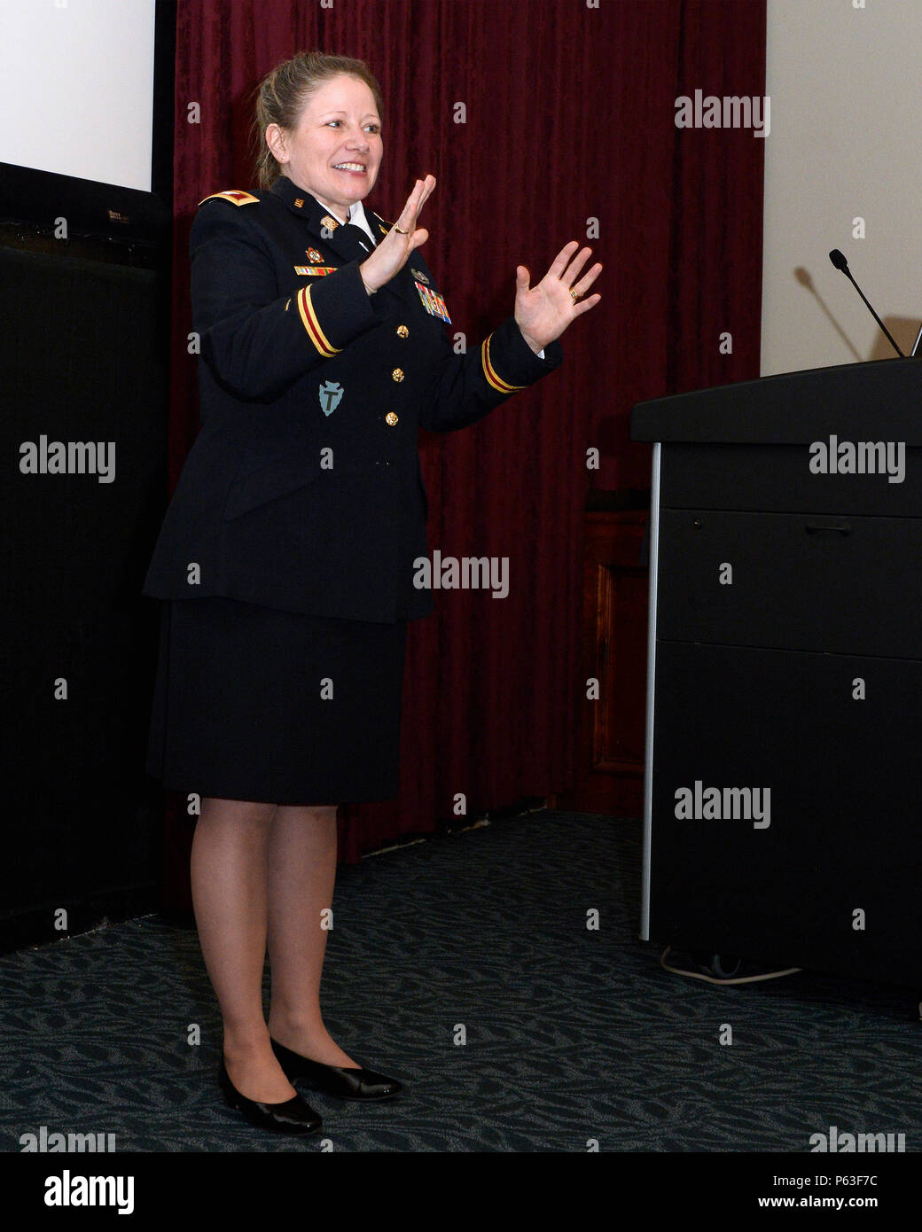 Col. Michelle Bryant delivers her speech during her promotion ceremony ...