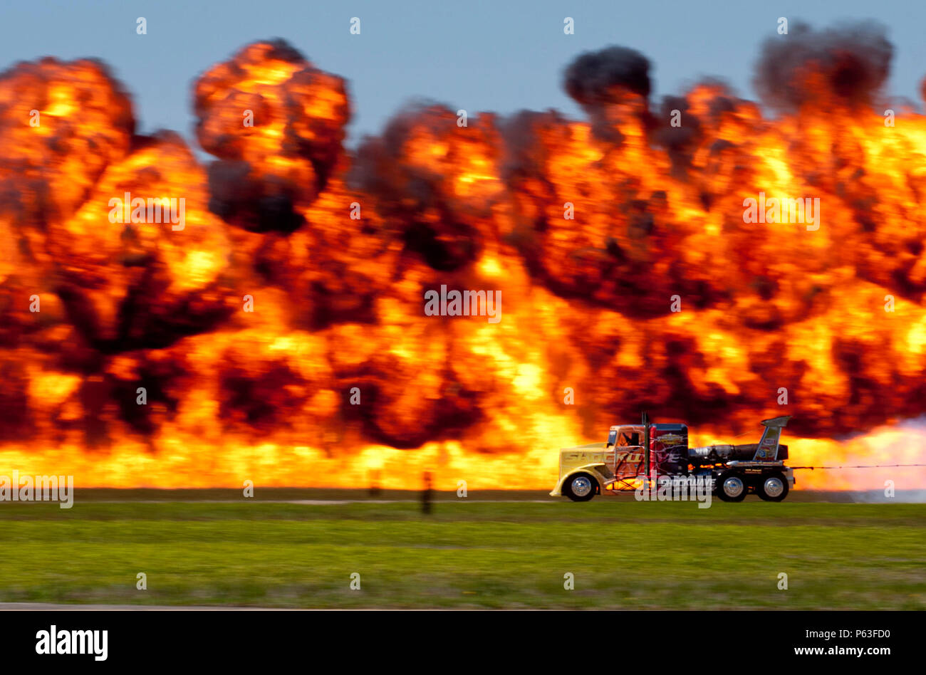 The SHOCKWAVE Jet Truck races in front of a pyrotechnic “wall of fire ...