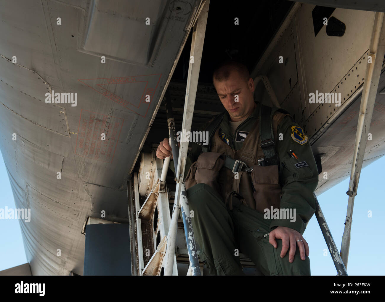 A 9th Bomb Squadron B-1B Lancer weapons systems officer prepares to ...