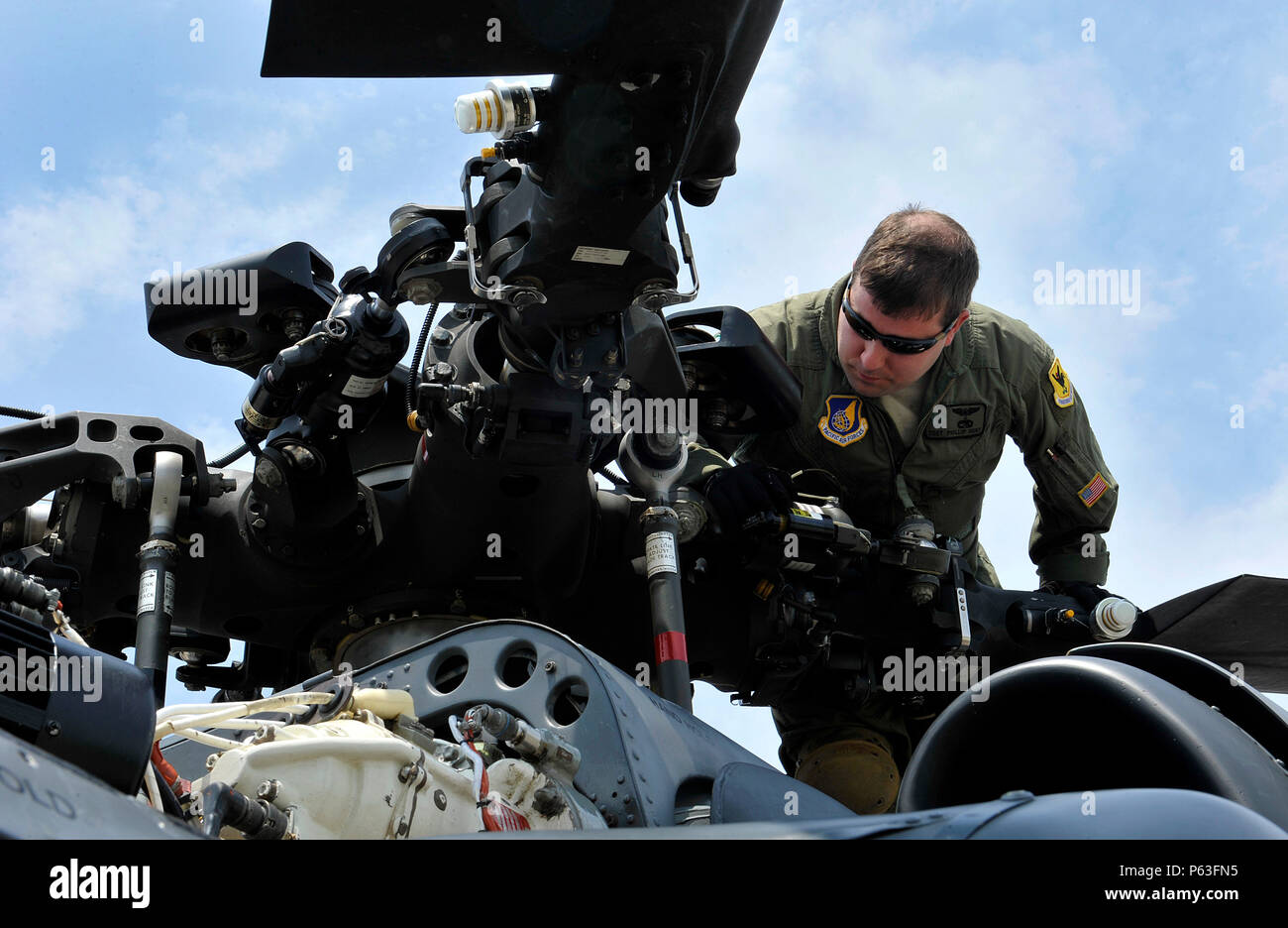 Staff members from the 33rd Helicopter Maintenance Unit inspected the ...