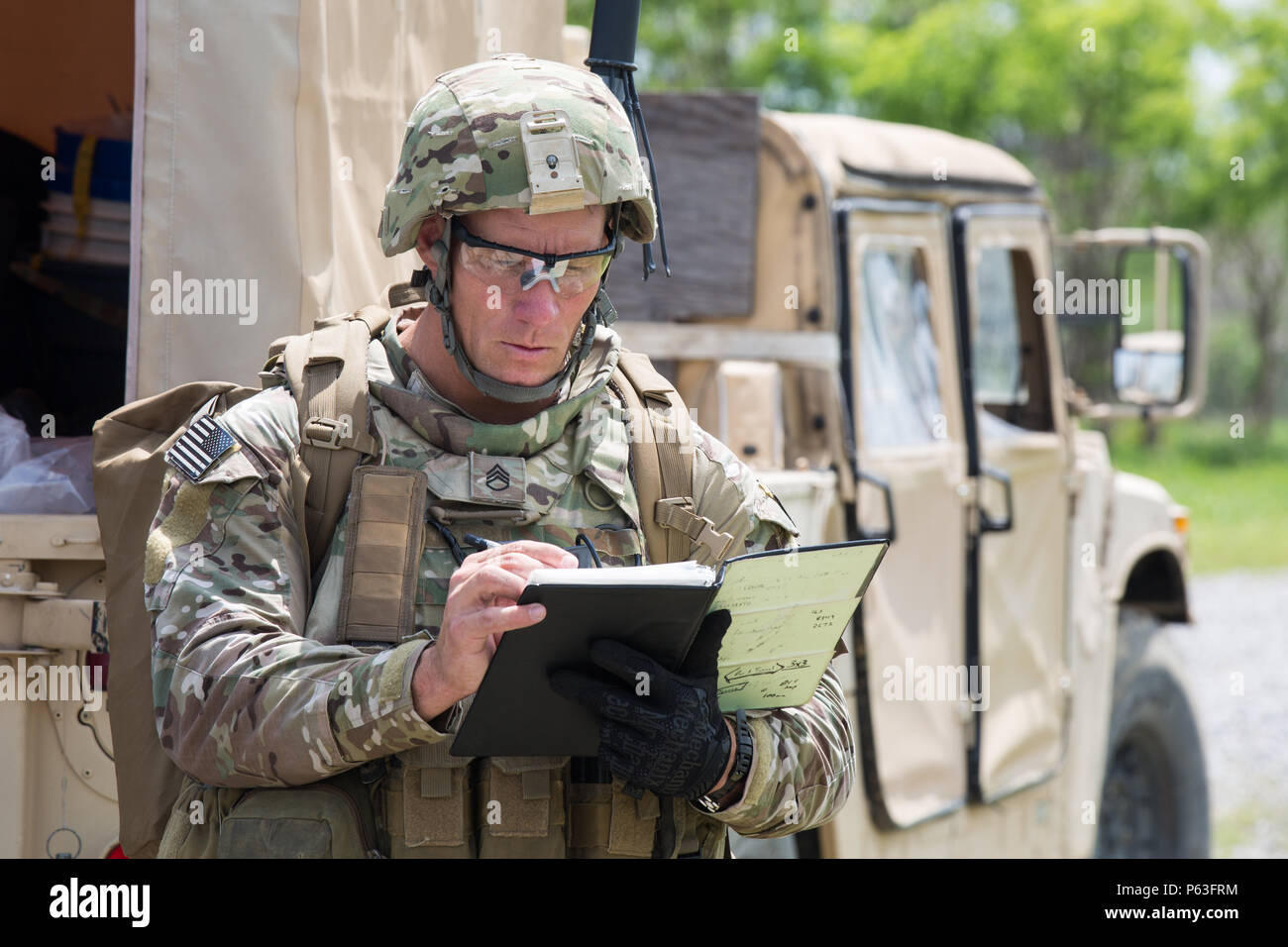 U.S. Army Staff Sgt. Jason Fedak, assigned to the 722nd Ordnance ...