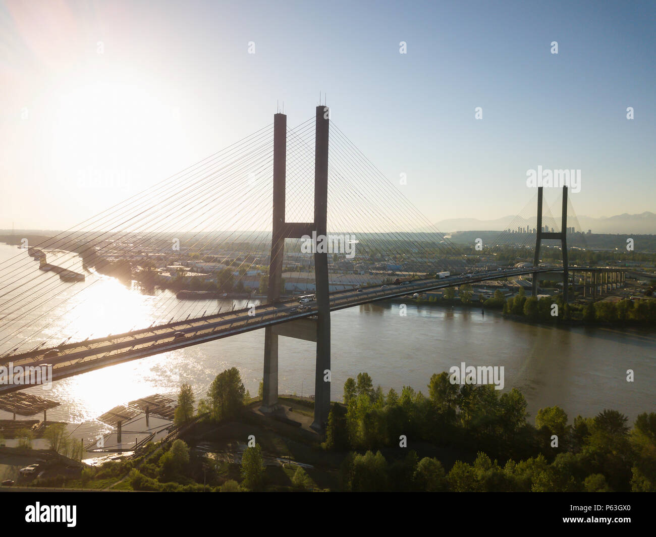 Aerial view of Alex Fraser Bridge during a vibrant sunny day. Taken in ...