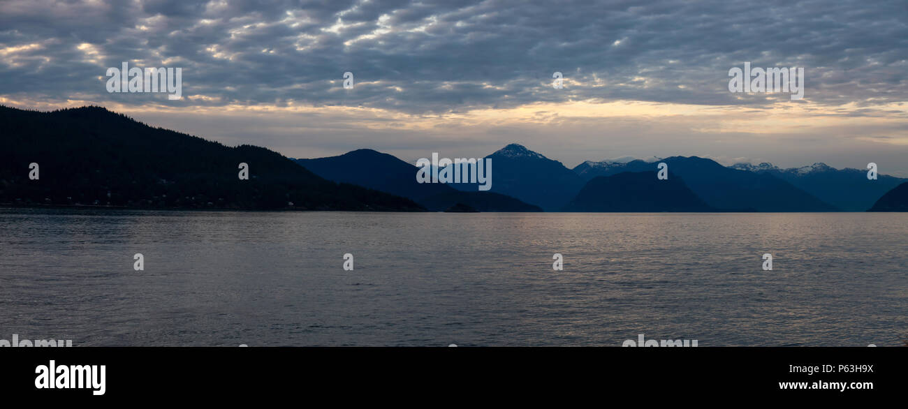 View of Howe Sound during a cloudy sunset. Taken in West Vancouver, BC ...