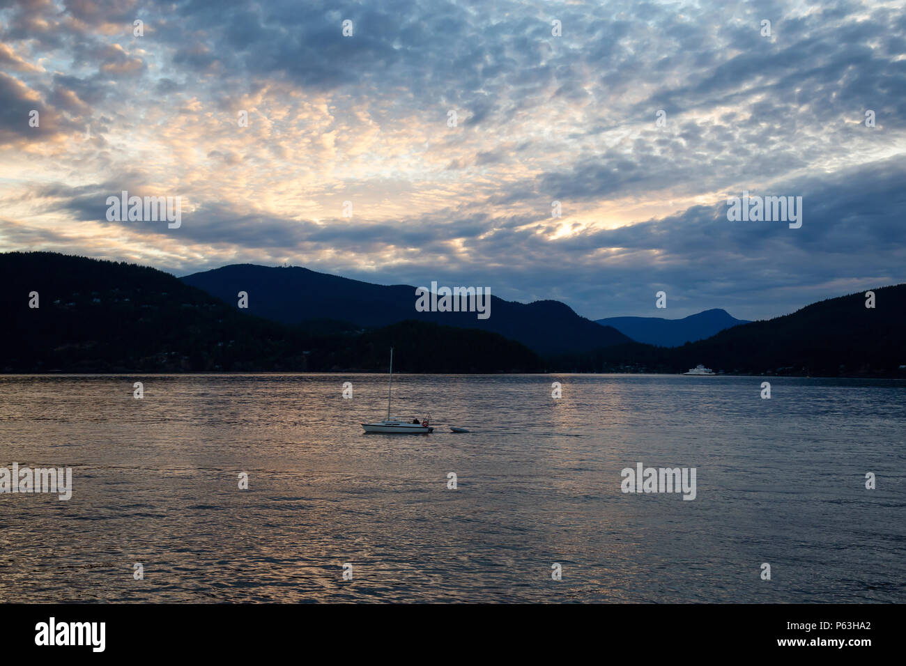 View of Howe Sound during a cloudy sunset. Taken in West Vancouver, BC ...