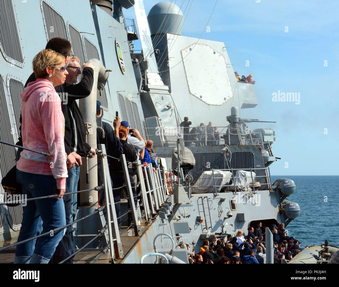 ATLANTIC OCEAN (April 25, 2016) Family, friends and guests observe a ...