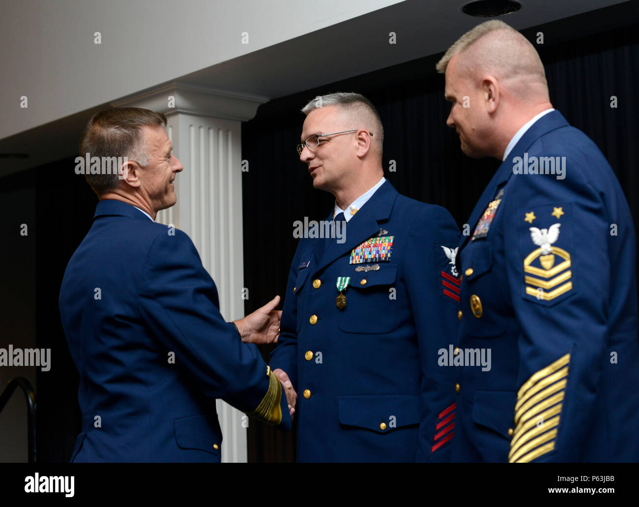 Adm. Paul Zukunft, commandant of the Coast Guard, and Coast Guard ...
