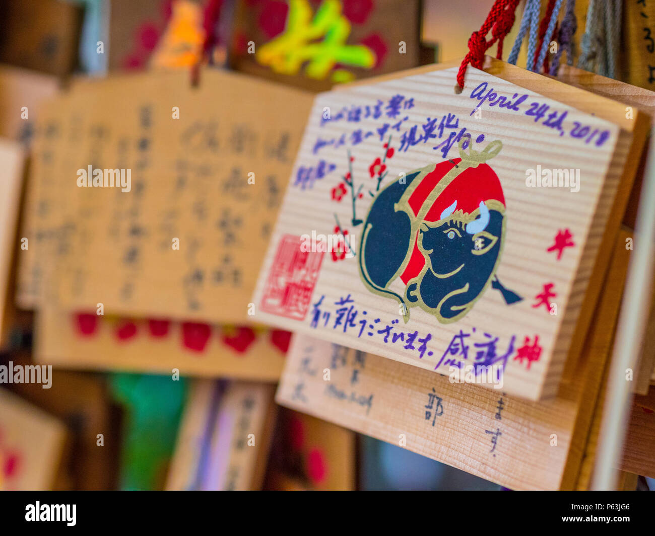 Wishes written on wooden plates in a Buddhist Temple in Japan - TOKYO ...