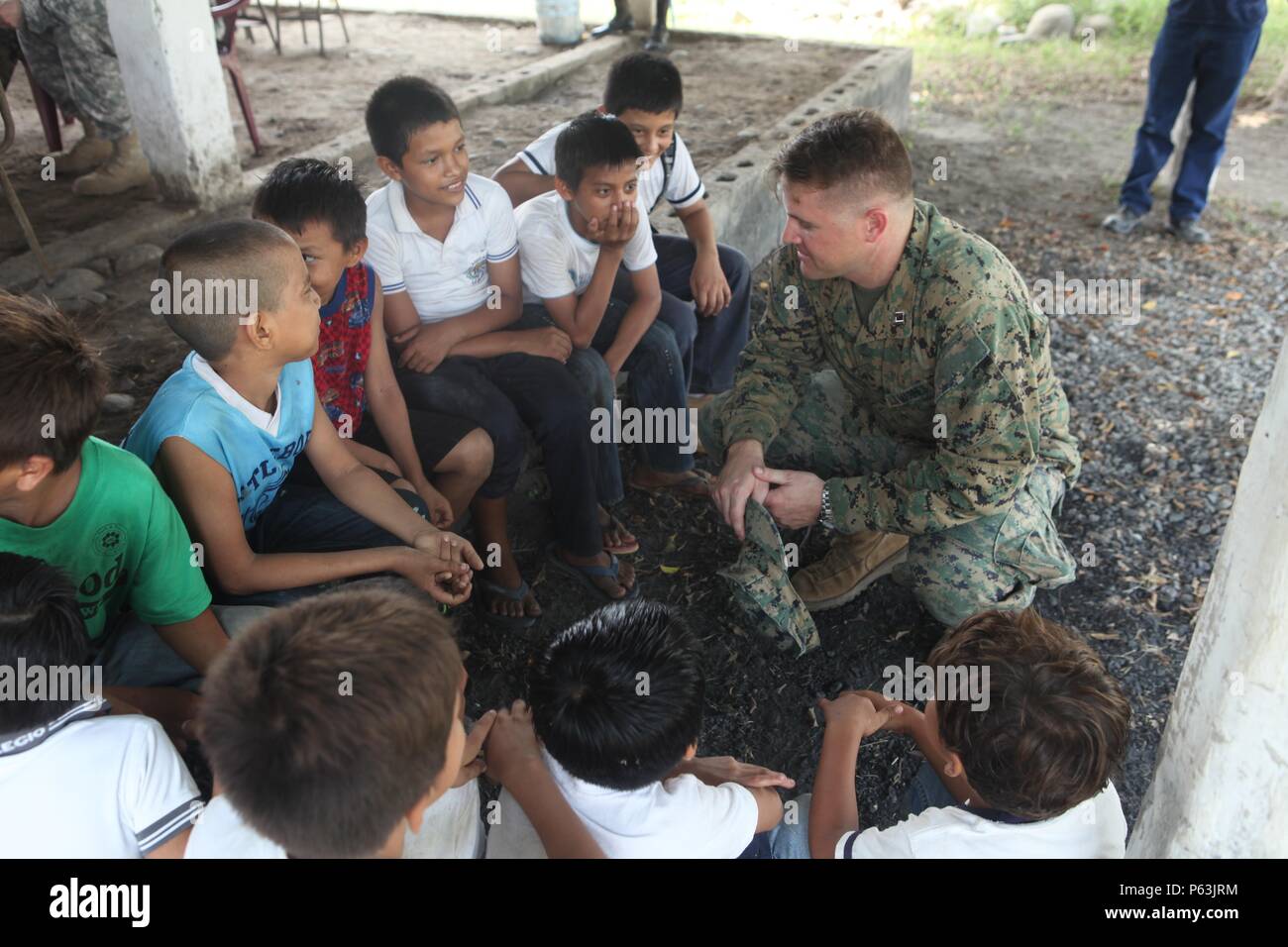U.S. Marine Corps Capt. James Atkinson of the 4th Civil Affairs Group ...