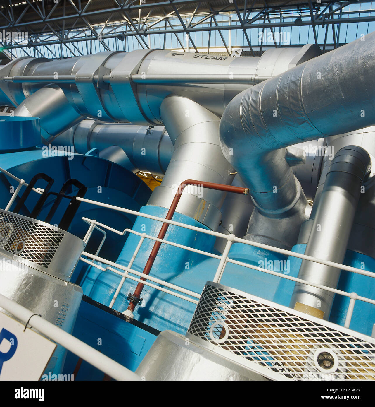 Pipes inside industrial facility Stock Photo - Alamy