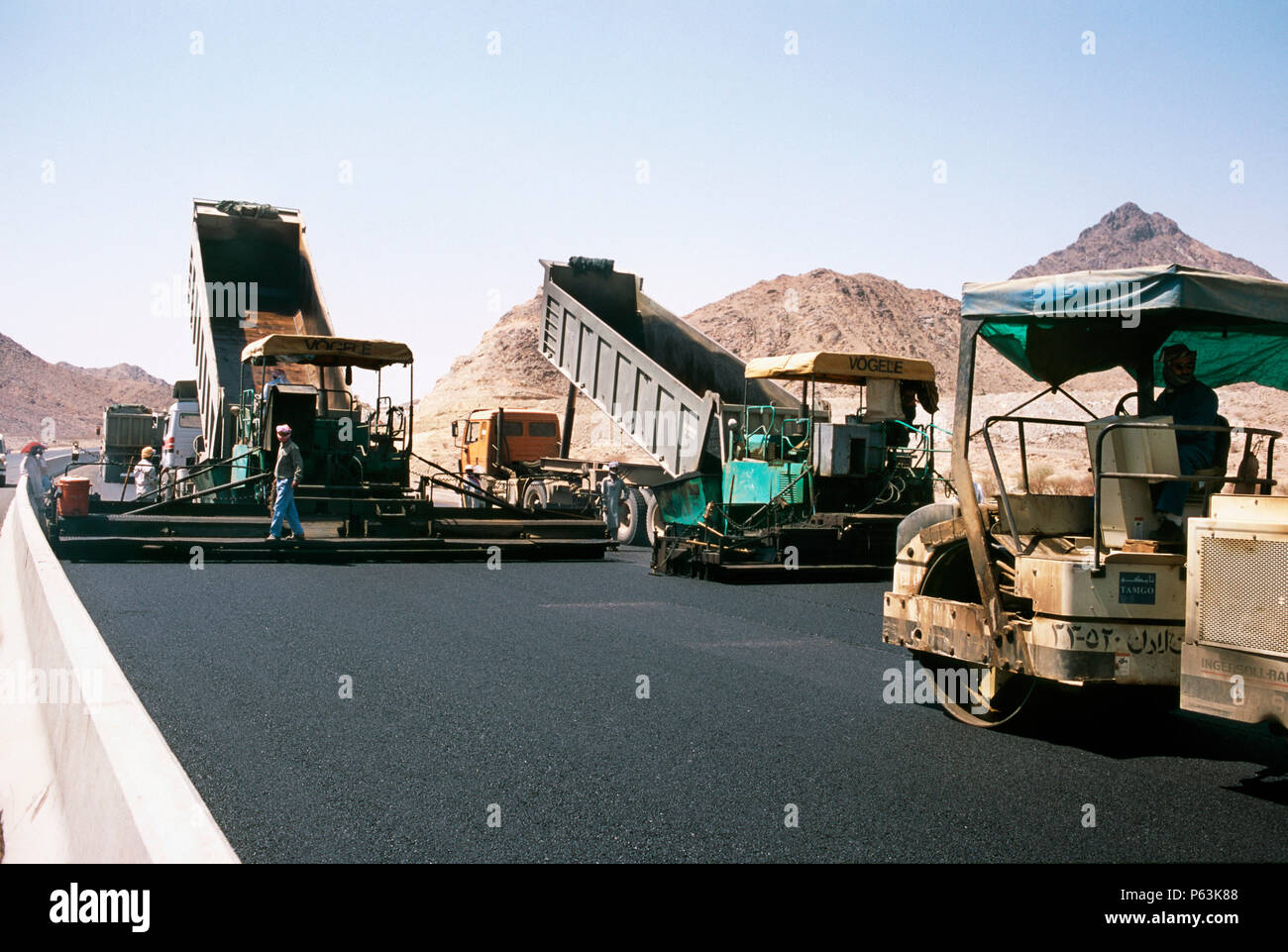 Asphalt plant has had special extensions to the screeds installed by ...