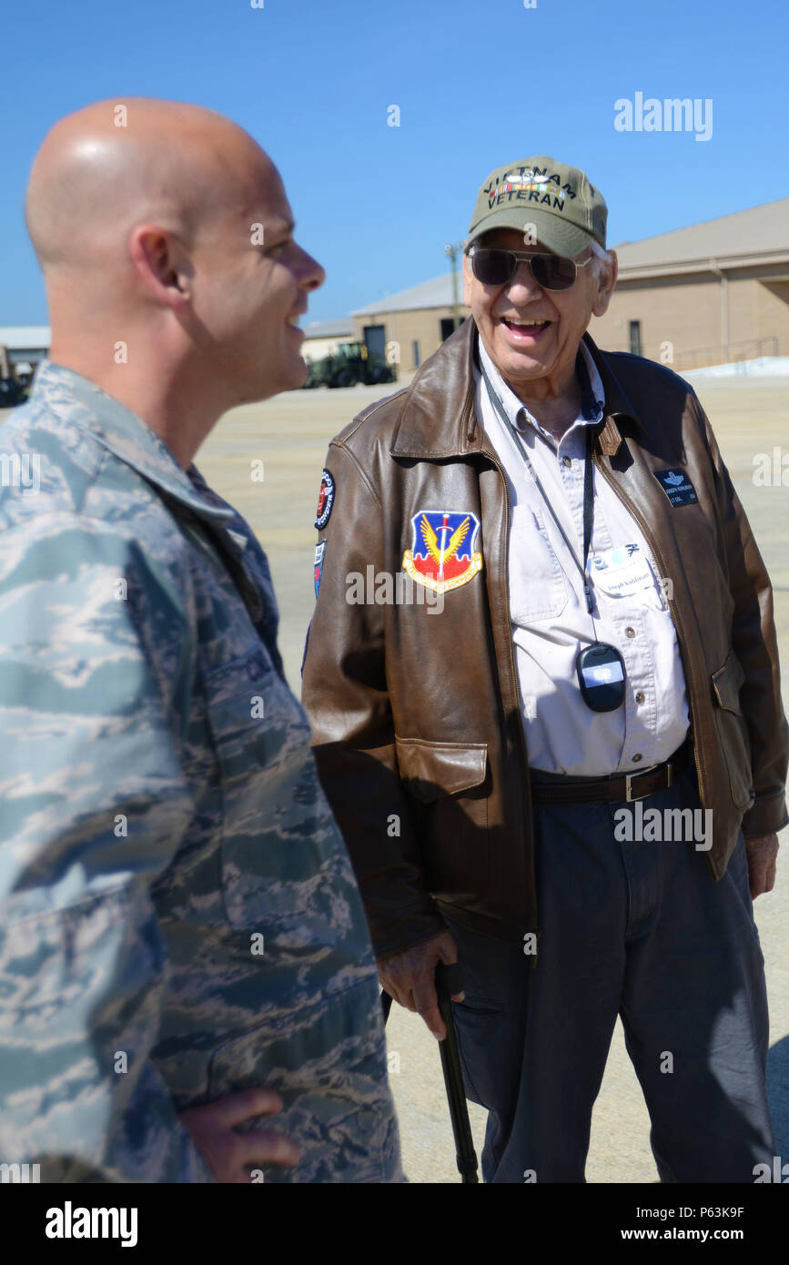 Retired U.S. Air Force Lt. Col. Joseph Kuhlmann speaks with a member of ...