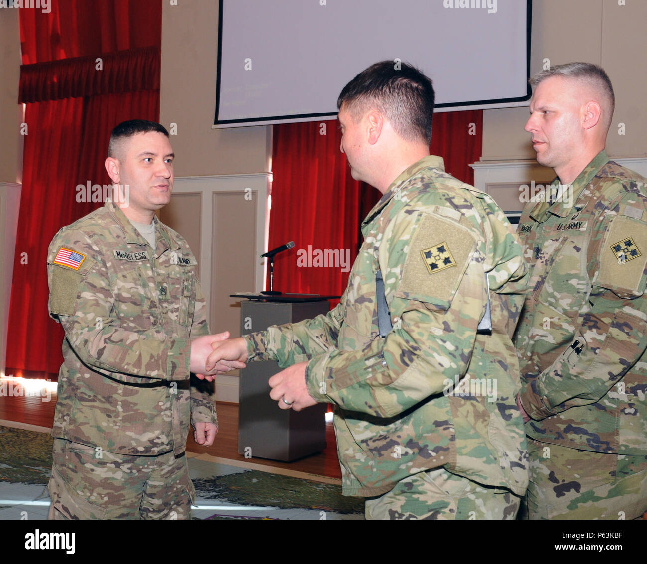 BAUMHOLDER, Germany – Lt. Col. Bryan Love (center) gives Staff Sgt ...