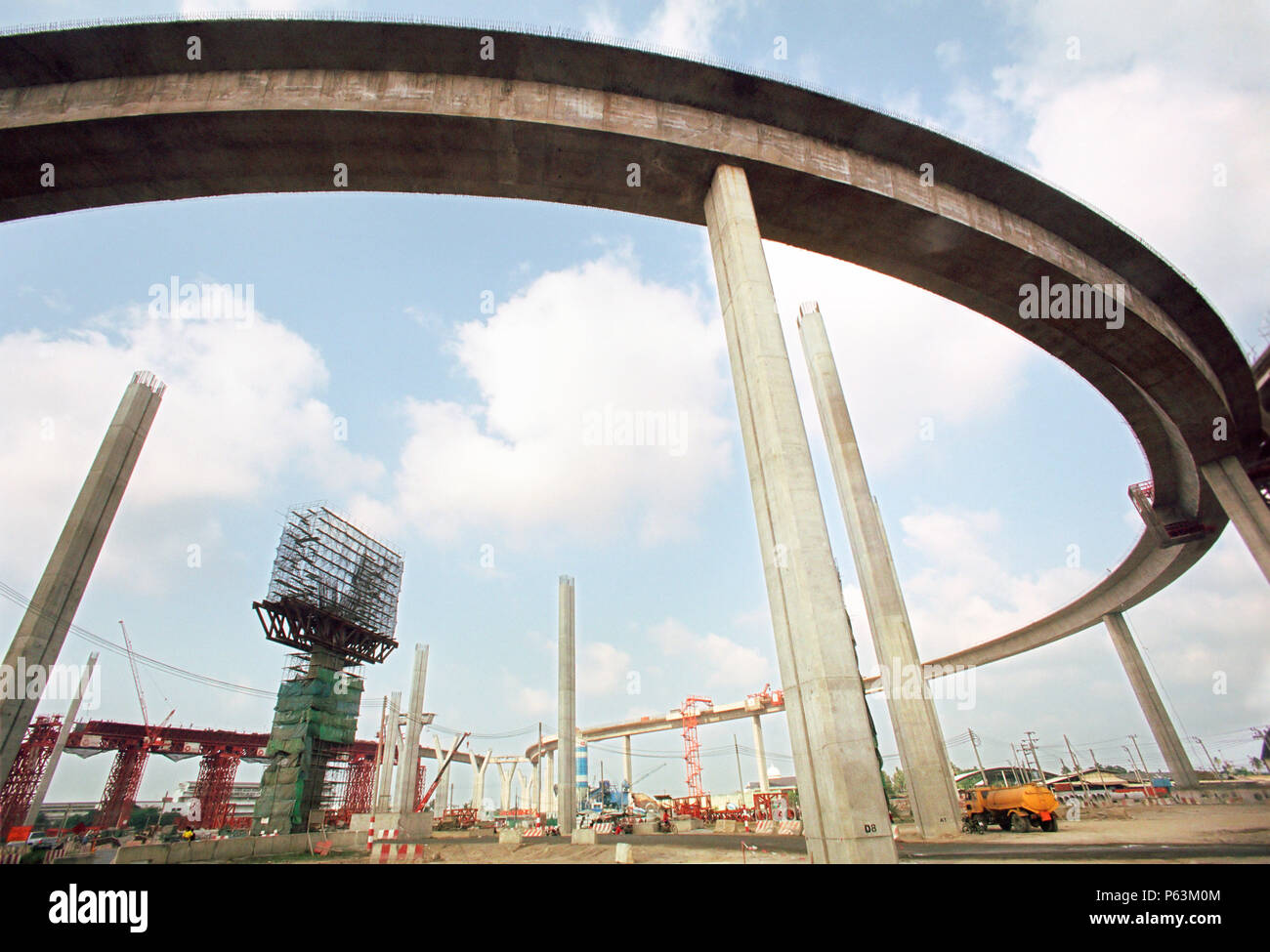 Central interchange curved ramps under construction on gantry of Mega ...