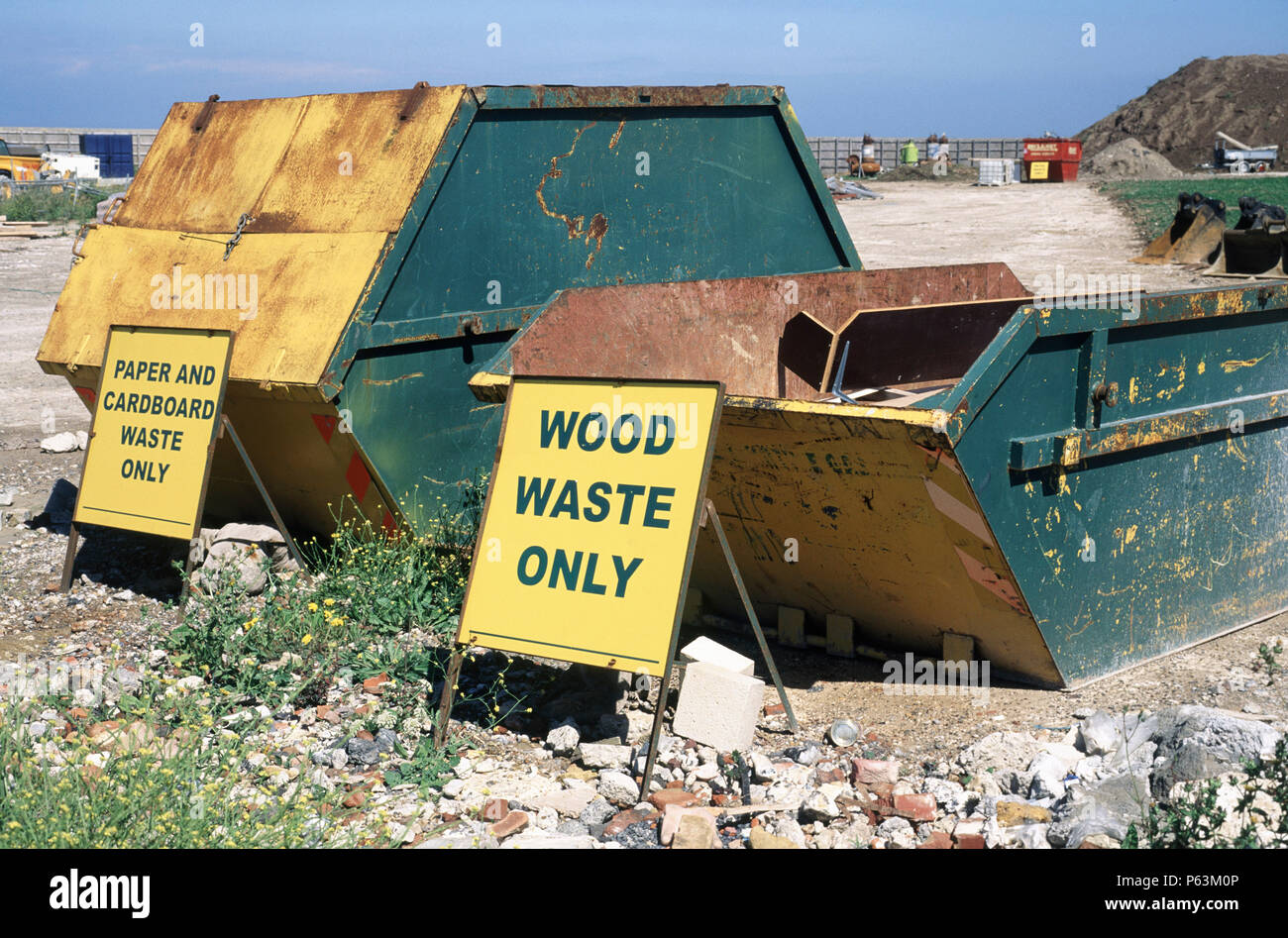 Skips for various waste types on a site in Kent Stock Photo - Alamy
