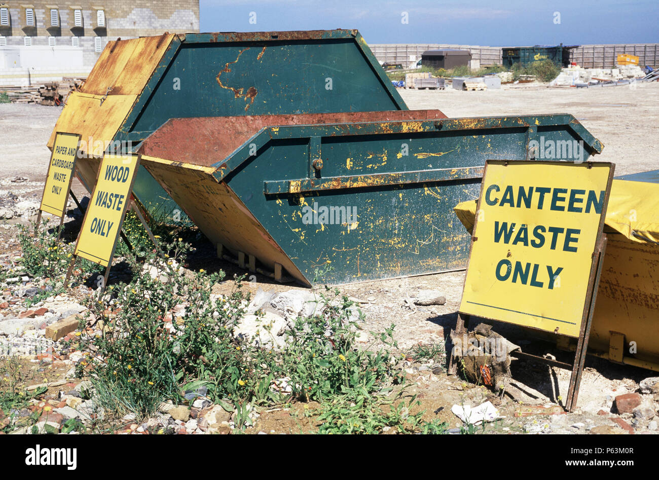 Skips for various waste types on a site in Kent Stock Photo - Alamy