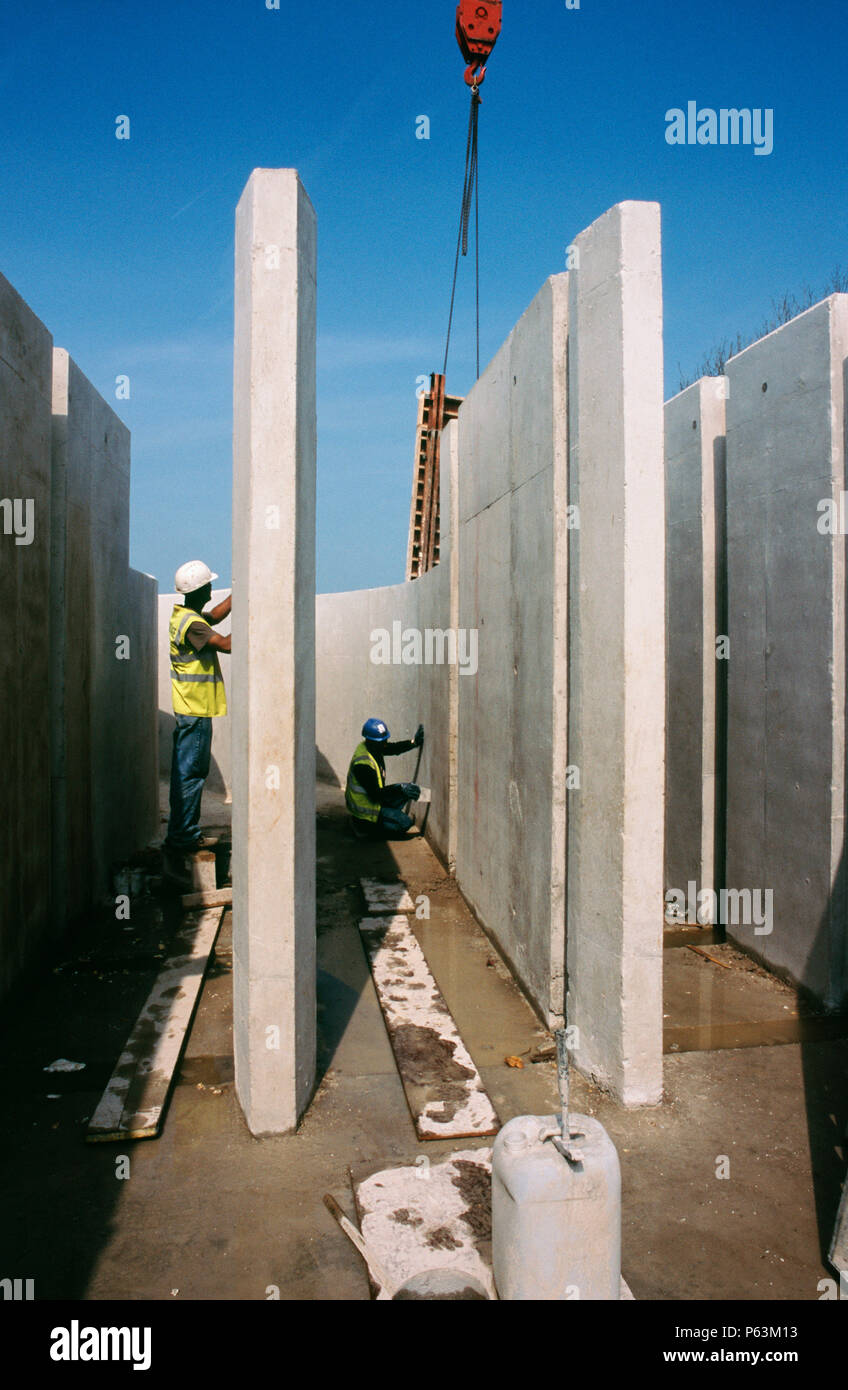 Finishing work on concrete flow channels at the wastewater treatment ...