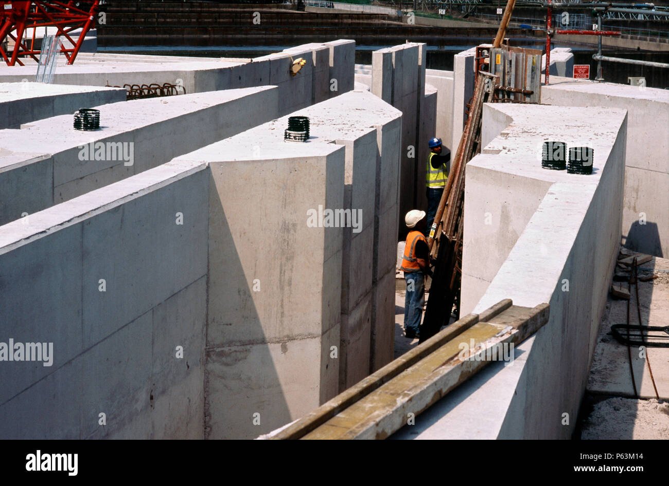 Finishing work on concrete flow channels at the wastewater treatment ...