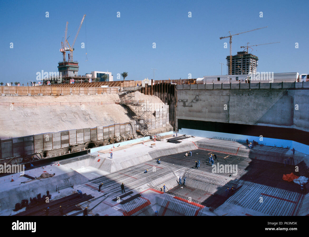 Laying reinforcement out for a major concrete pour in the basement of a ...