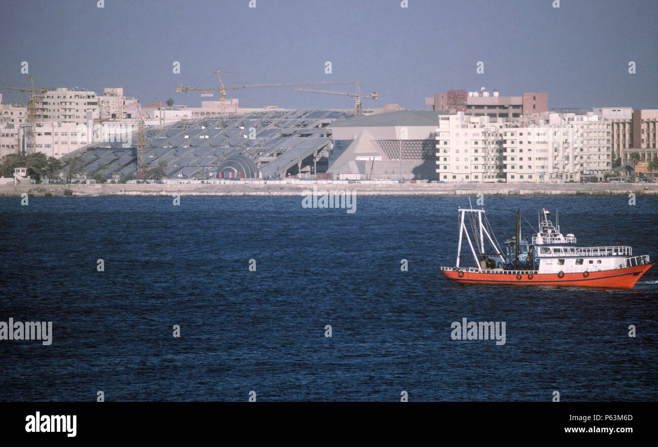 Looking across Alexandria harbor bay in Egypt to the new library ...