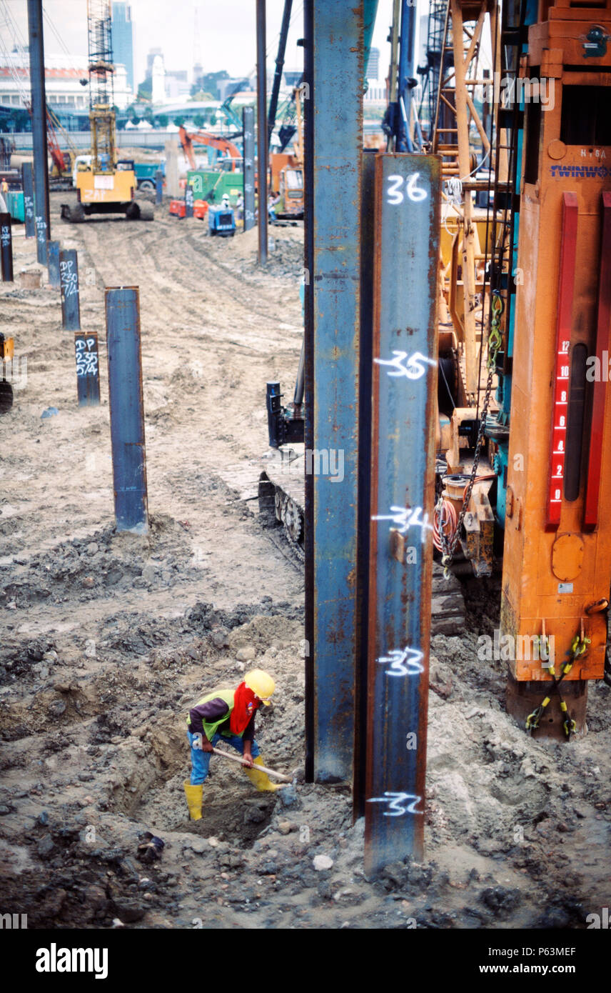 Piling huge steel stanchions for the temporary works propping around ...