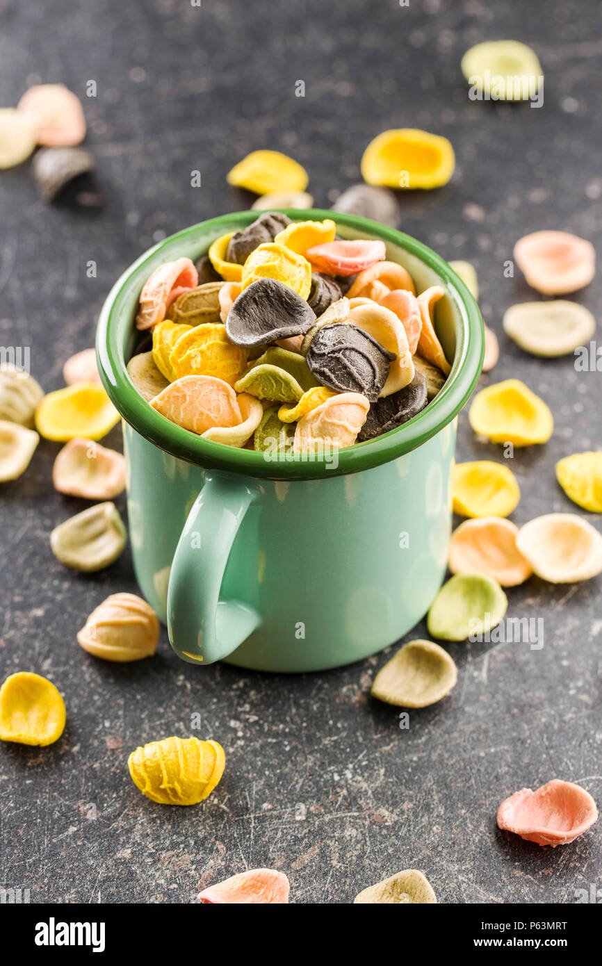 Italian rainbow pasta in cup Stock Photo - Alamy