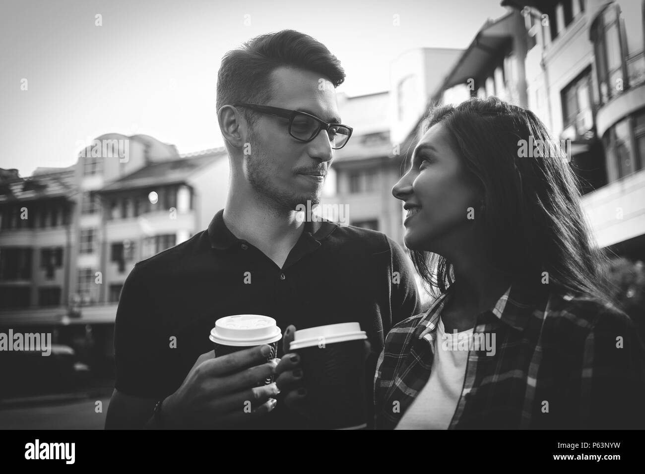 Woman street coffee walking Black and White Stock Photos & Images - Alamy