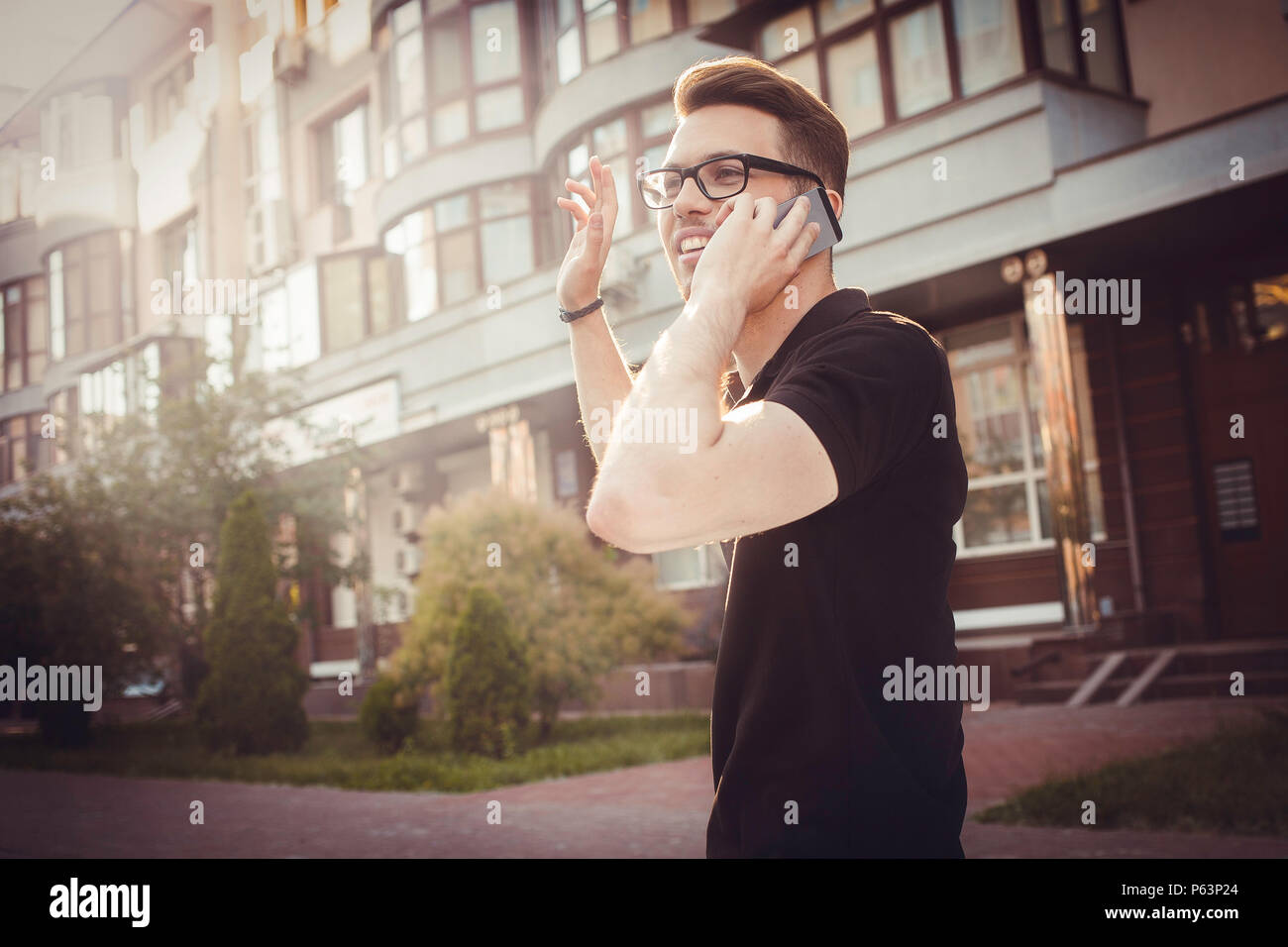 Friendly young man saying hi-res stock photography and images - Alamy