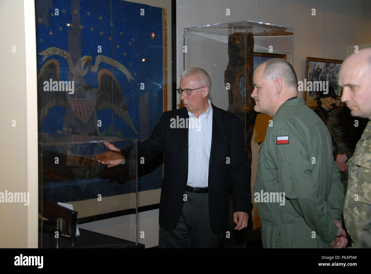 Museum Director and retired Army Brig. Gen. Stewart Reeve (left) shows ...