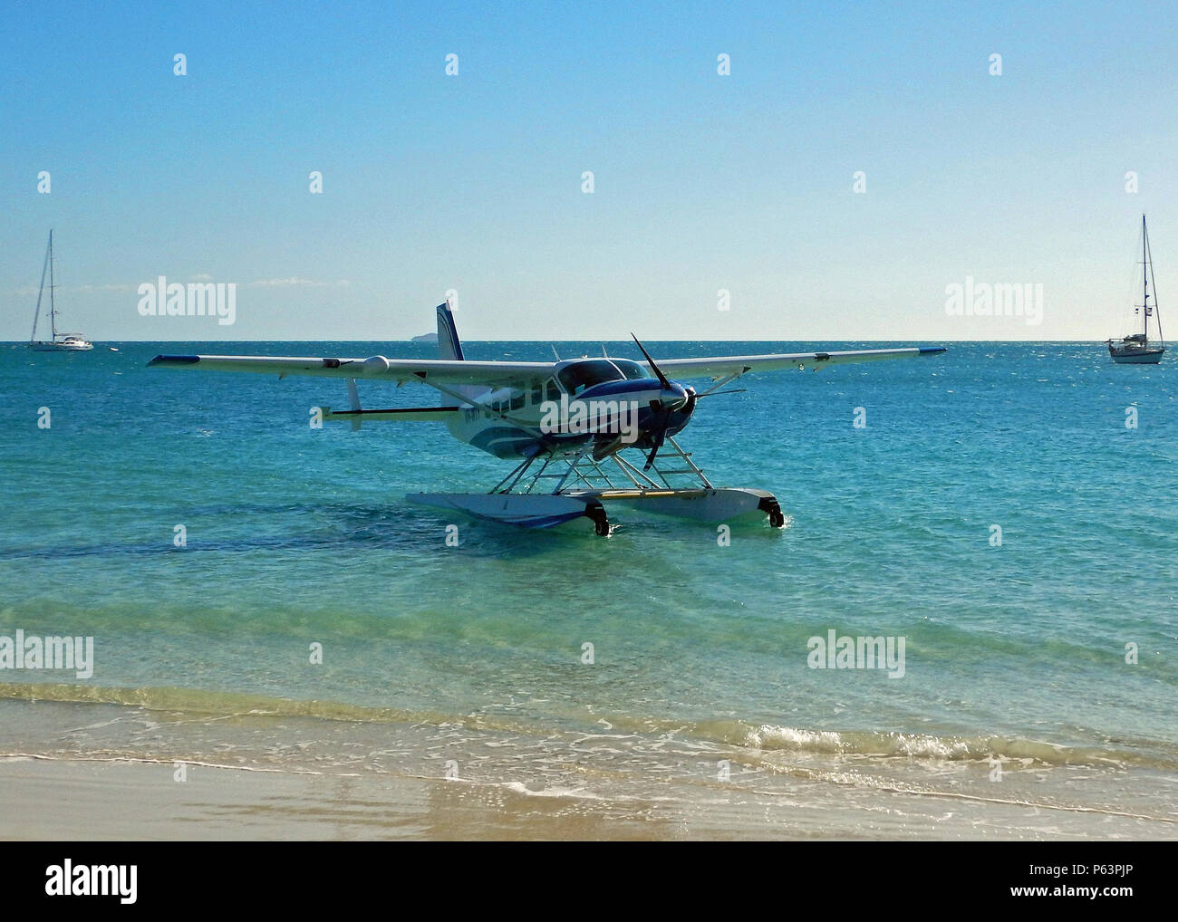 Seaplane on a beach Stock Photo - Alamy