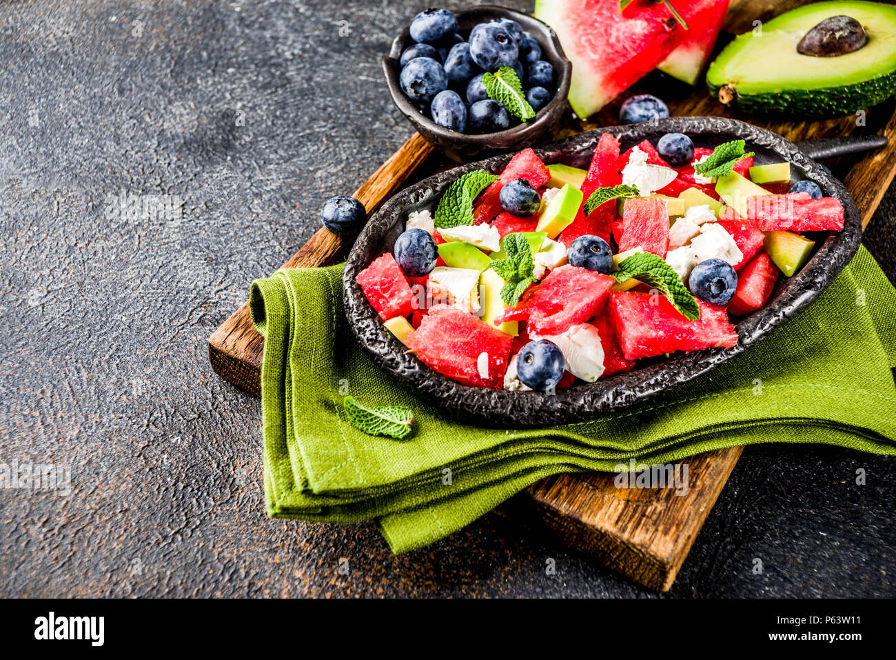 Summer food concept, fresh cold watermelon salad with feta cheese ...