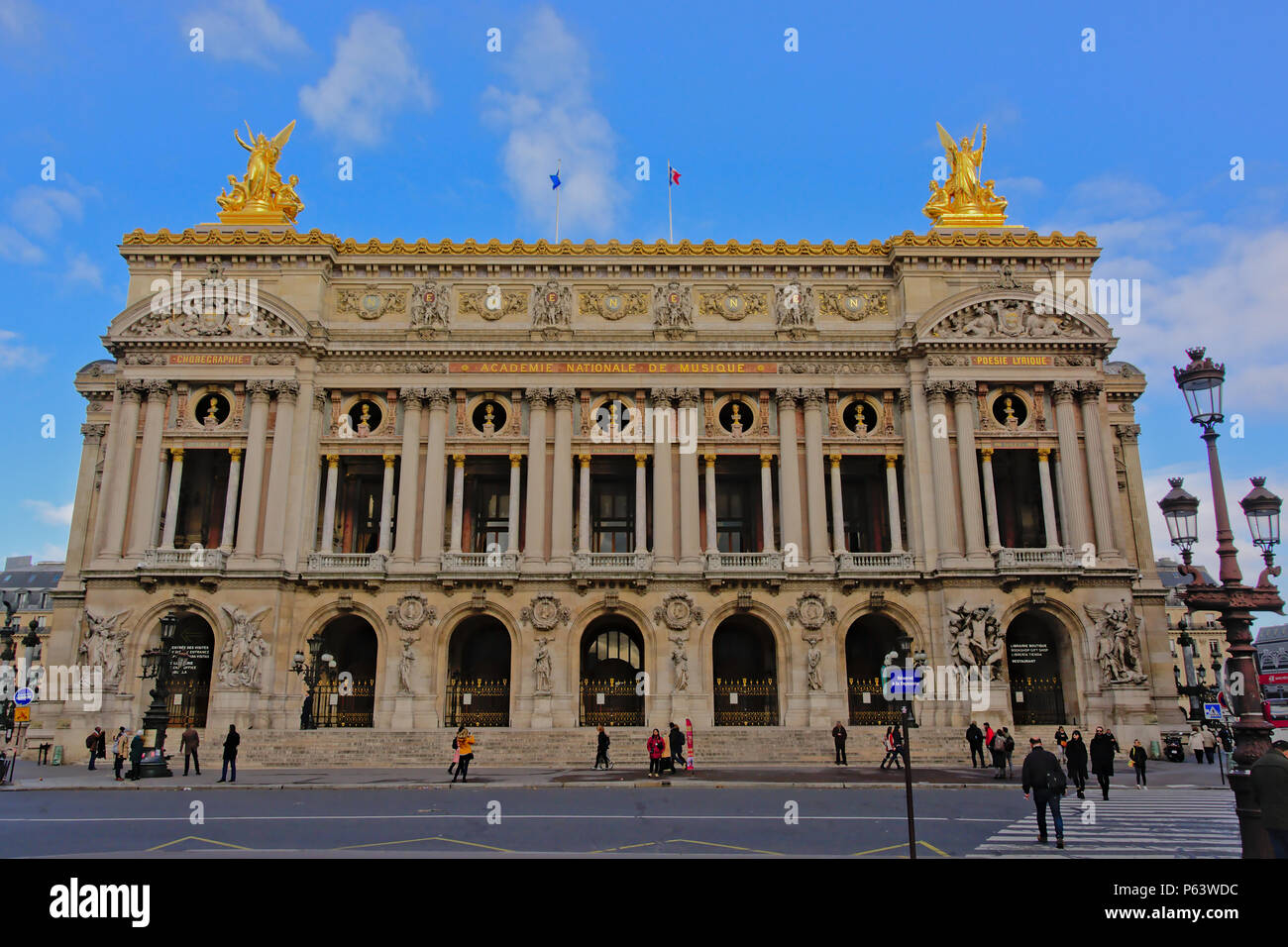 alais Garnier, ornate opera building with golden statues in Second ...