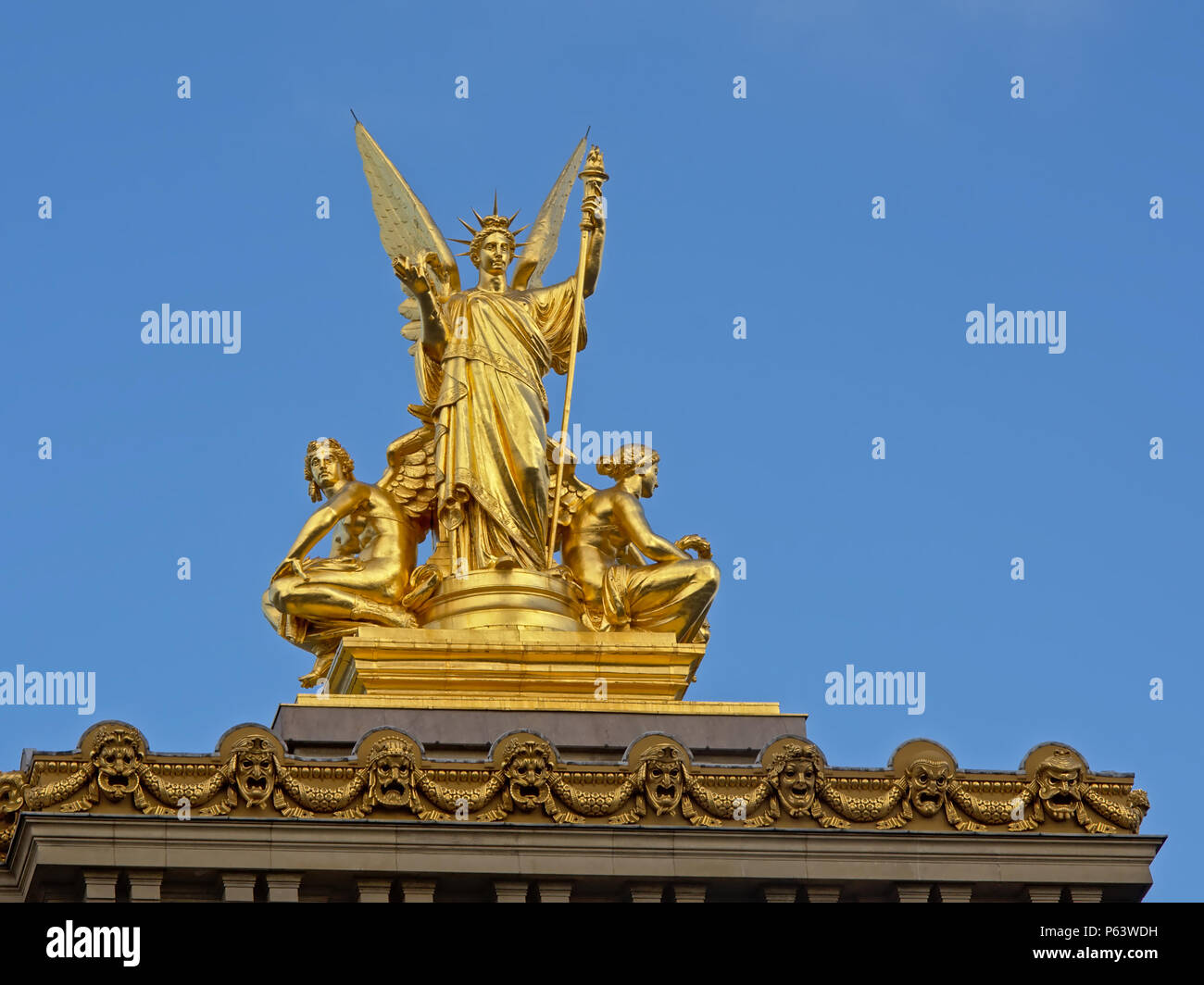 Golden statue of poetry on top of the palais Garnier, opera building of ...