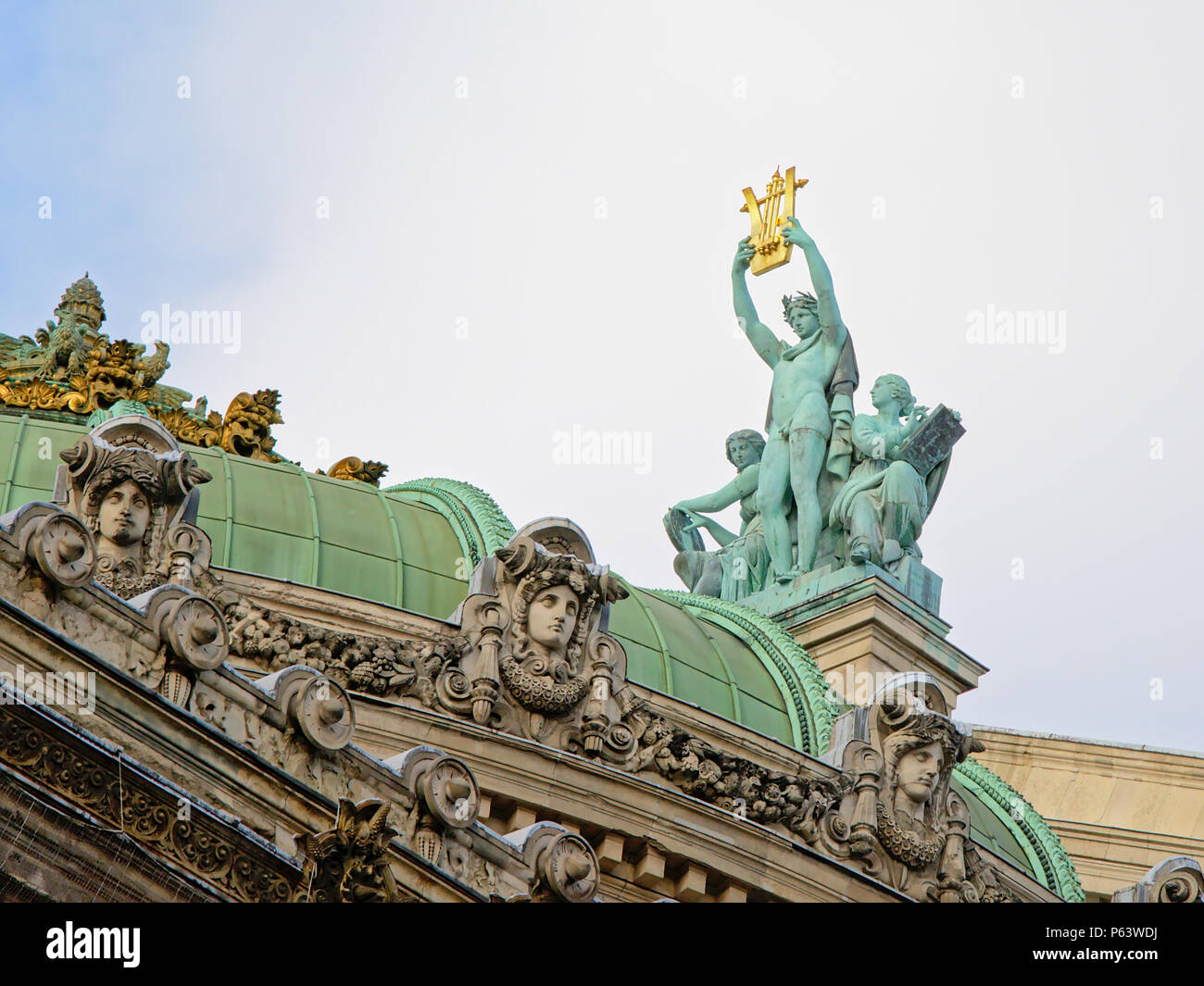 statue of Apolo, Greek god of poetry and music on top of the palais ...