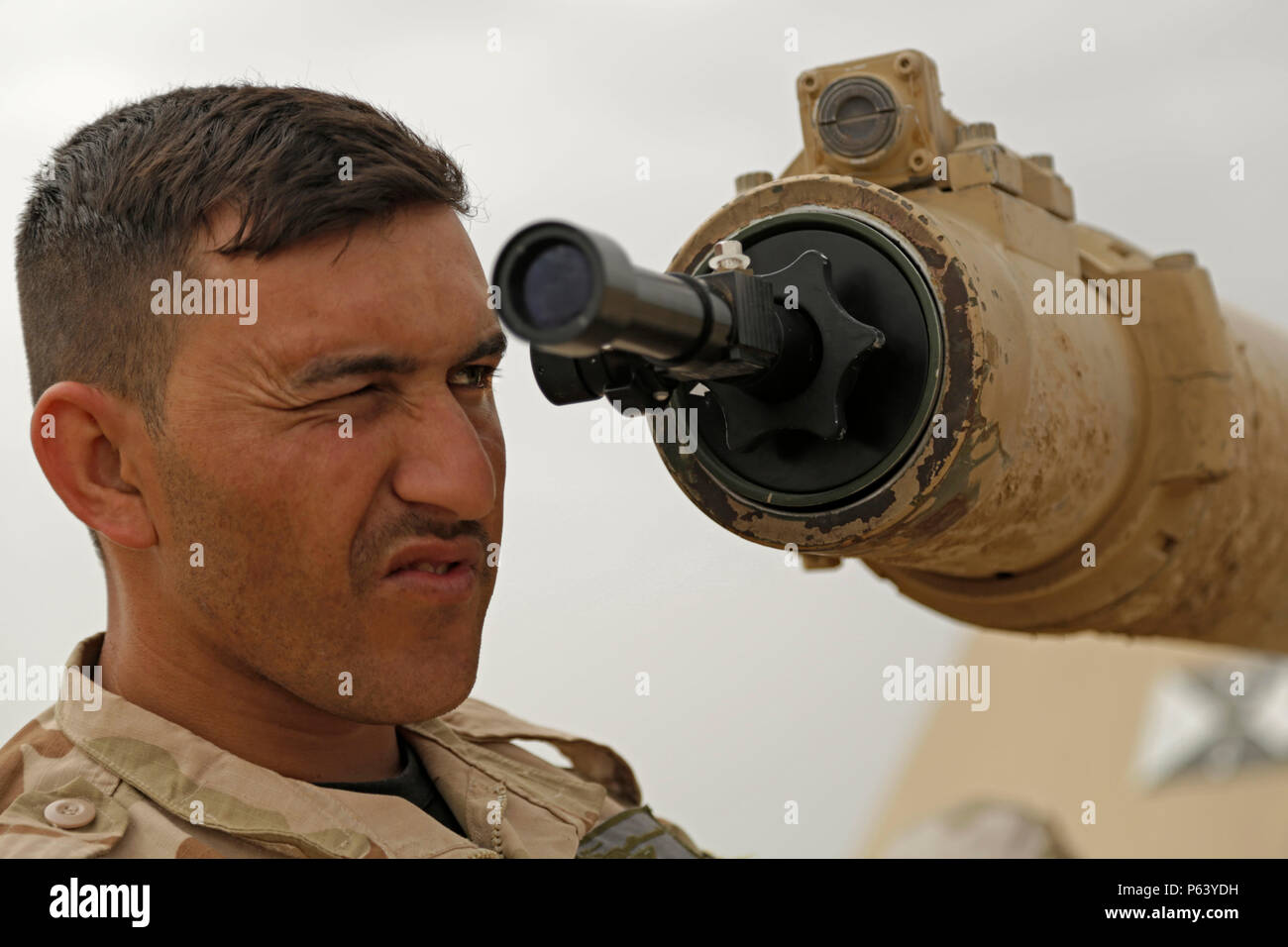 An Iraqi soldier, assigned to the 35th Iraqi Army Brigade, looks ...