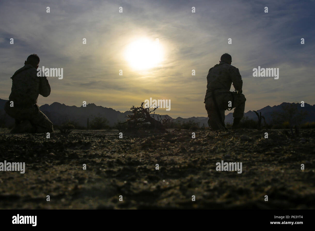 U.S. Marine Corps Lance Cpl. Christopher D. Robson, right, water ...