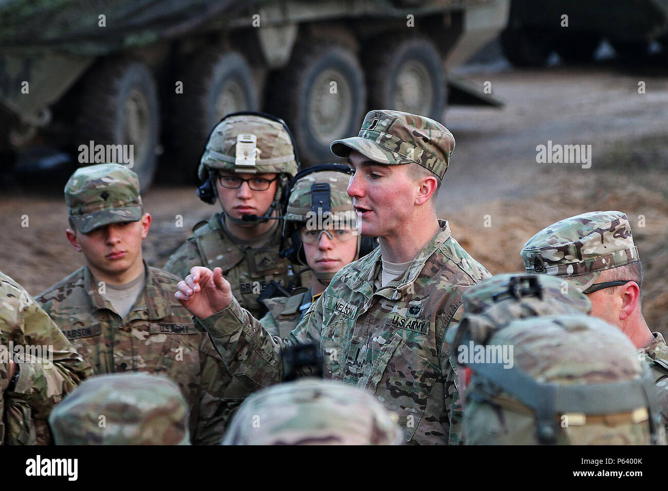 1st Lt. David Nelson (center), a mortar platoon leader assigned to ...