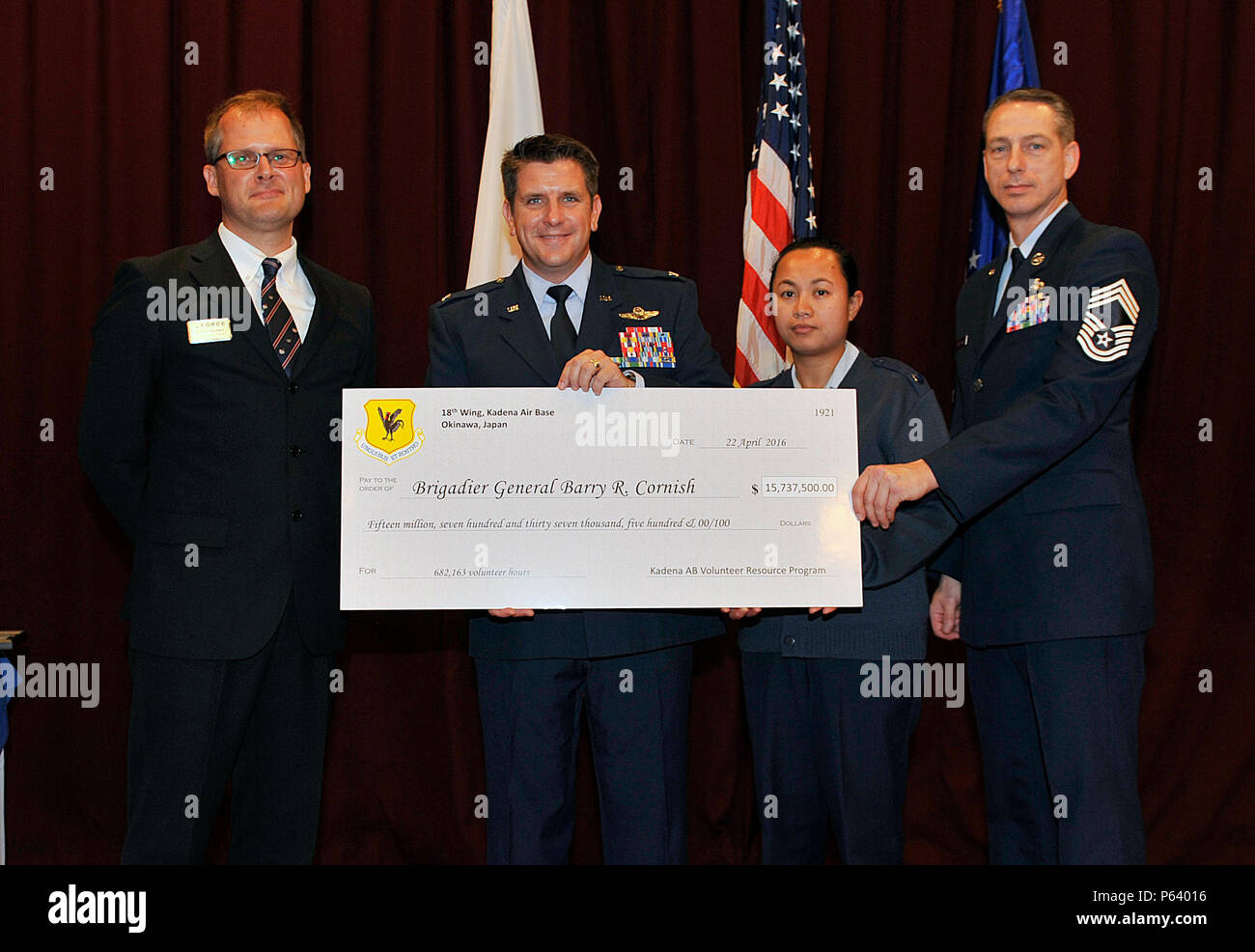 U.S. Air Force Col. Christopher Amrhein, 18th Wing vice commander, and ...