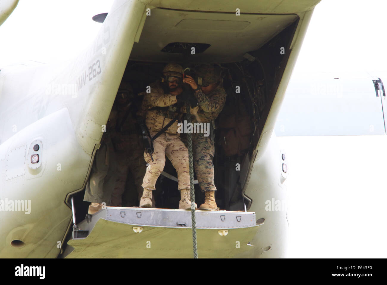 U.S. Marine Corps Staff Sgt. Alex A. Quinones, (right), Helicopter Rope ...