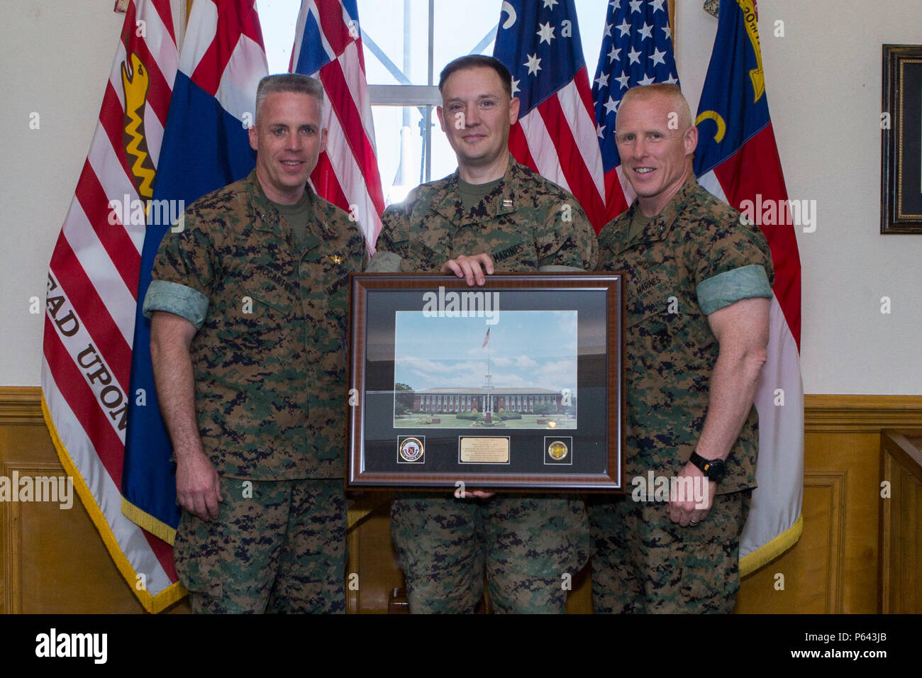 U.S. Marine Corps Col. Thomas McCarthy, left, chief of staff with ...