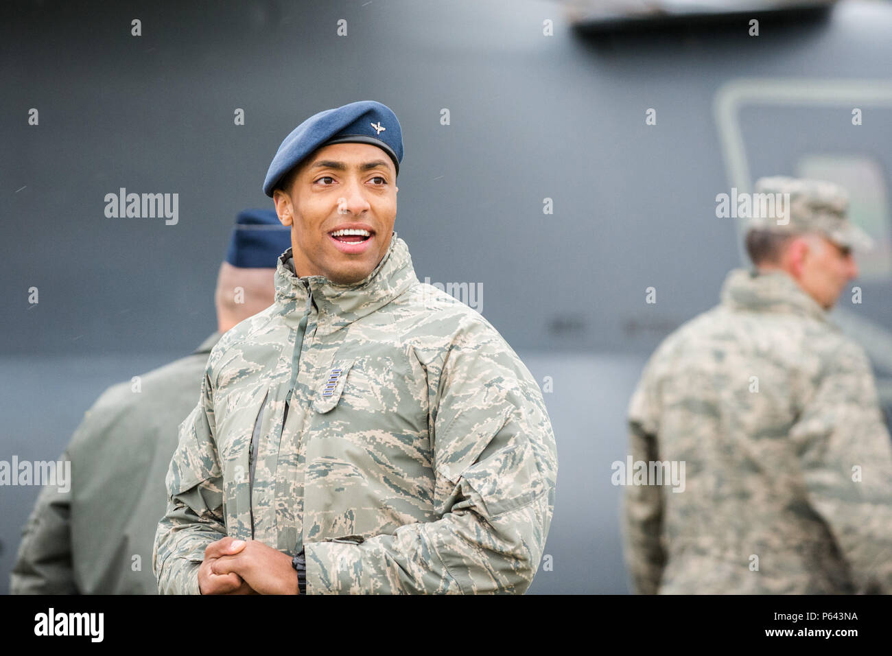 Kristov George, a senior and the Cadet Wing commander, crowds around a ...