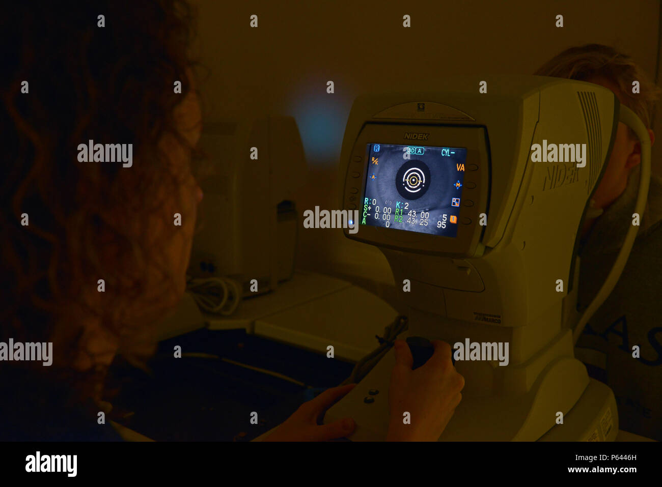 Kristen Judd, American Red Cross medical technician volunteer, uses an ...