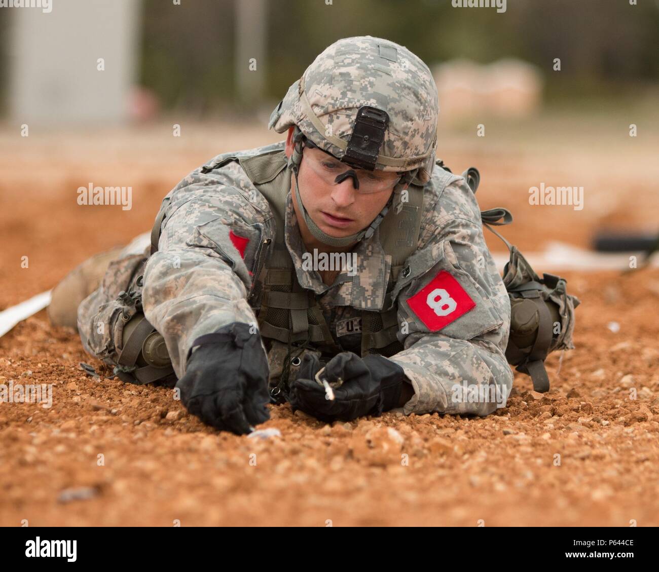 Capt. William Whitfield, probes for possible land mines in mine ...