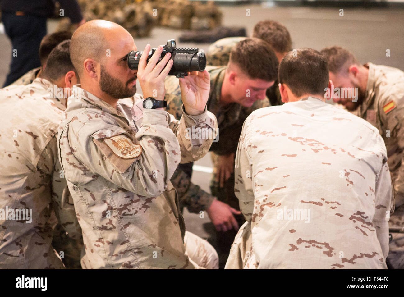 A Spanish Marine with Marine Infantry Brigade looks through the sights ...