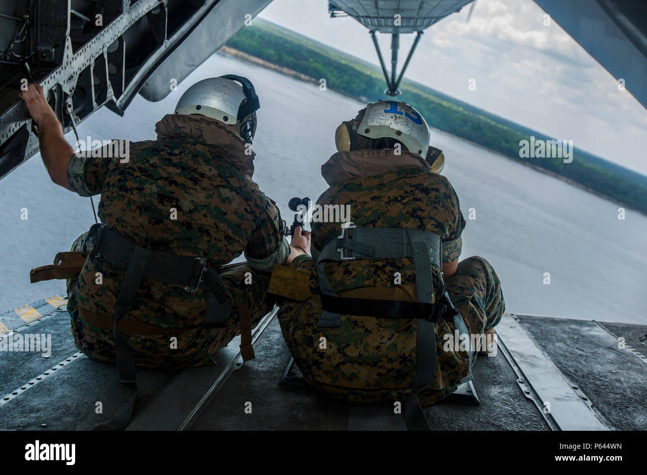 U.S. Marine Corps Staff Sgt. Albert Carls, left, and Lance Cpl. Daphne ...