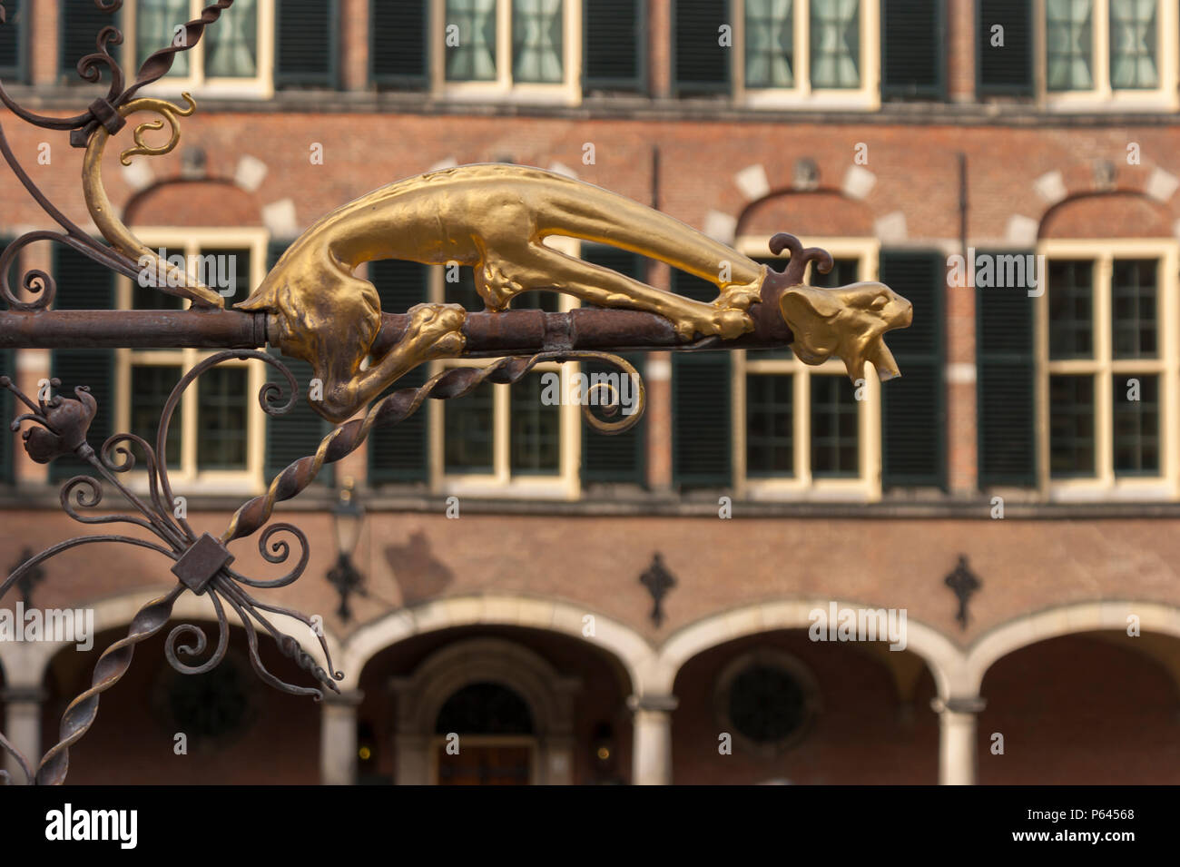 Detail with a golden Gargoyle of the neo-Gothic wrought-iron fountain ...